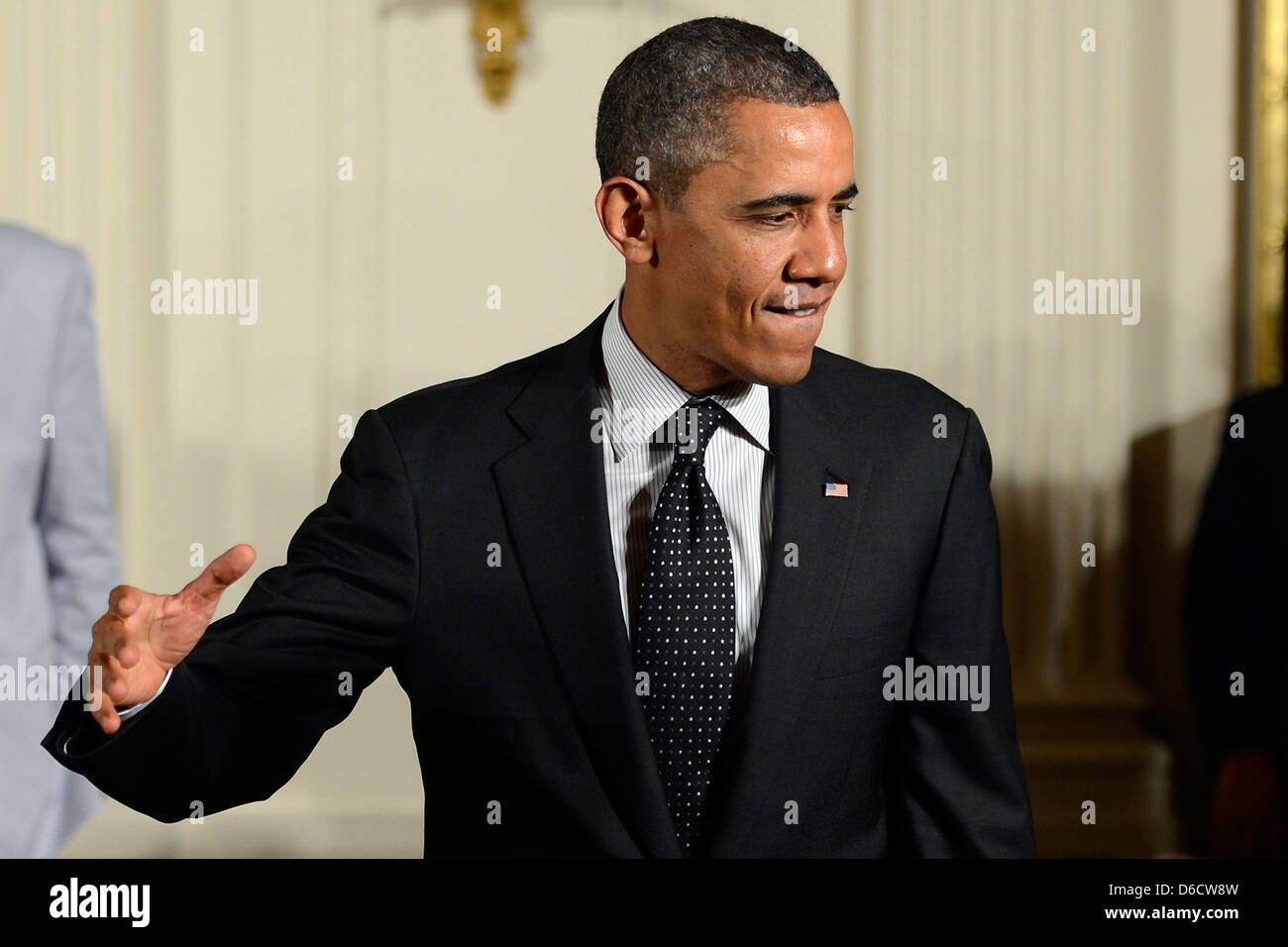 US President Barack Obama presents the Commander in Chief's trophy to ...