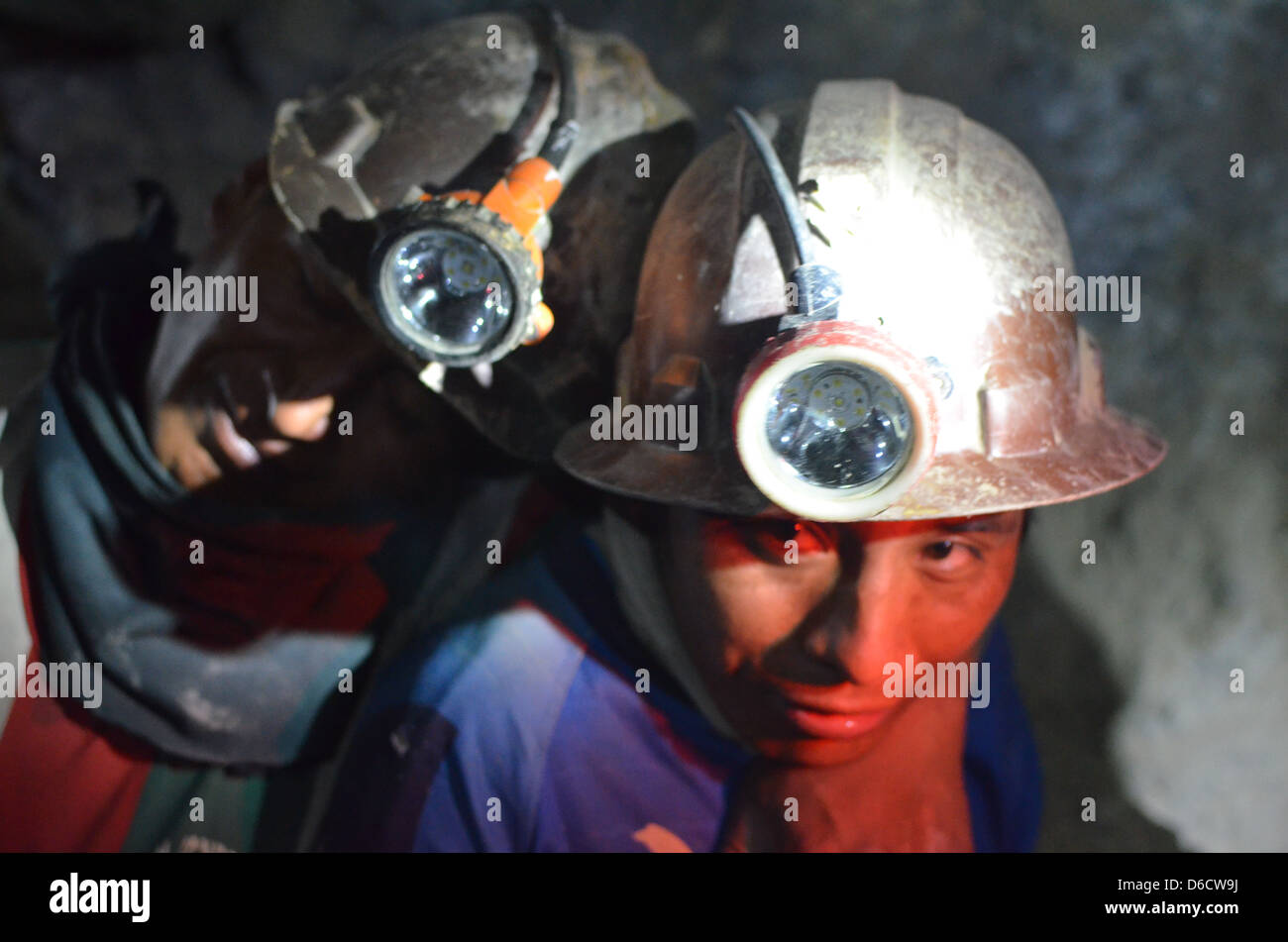 miners and visitors inside the Cerro Rico silve rmines, Potosi, Bolivia ...