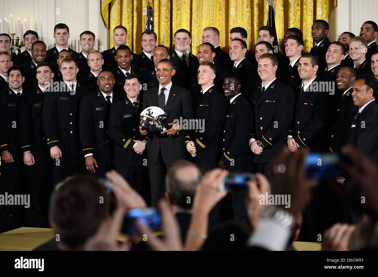 Navy football helmet team ceremony hi-res stock photography and images ...
