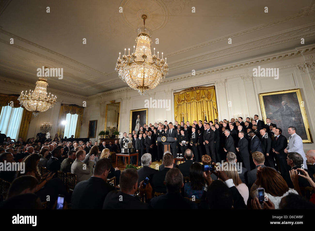 US President Barack Obama presents the Commander in Chief's trophy to ...