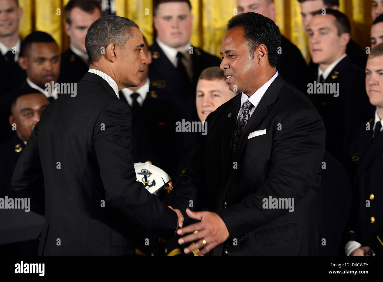 US President Barack Obama greets Ken Niumatalolo, head coach of the US ...