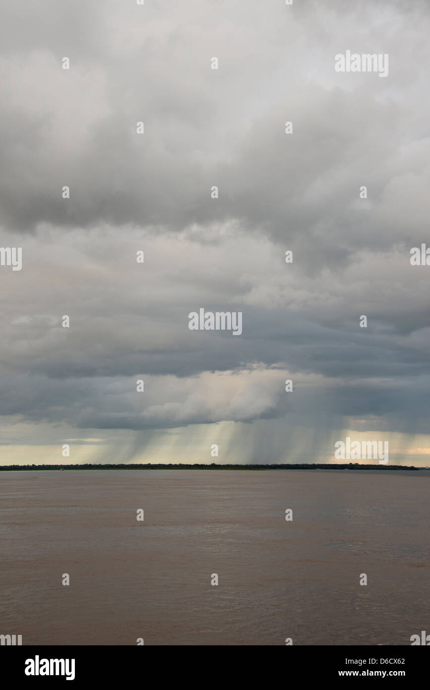 Brazil, Amazon River near Manaus. Typical rainstorm during the wet ...