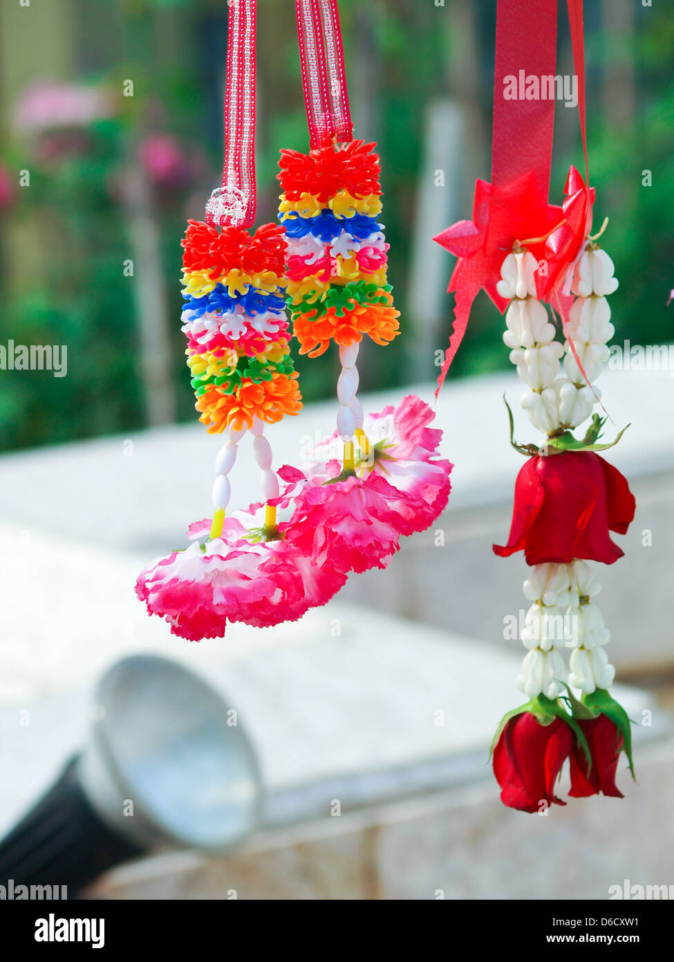 Hanging flower garland hi-res stock photography and images - Alamy