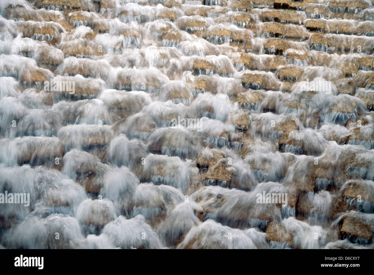 Fountain Water Running Over Stones Stock Photo - Alamy