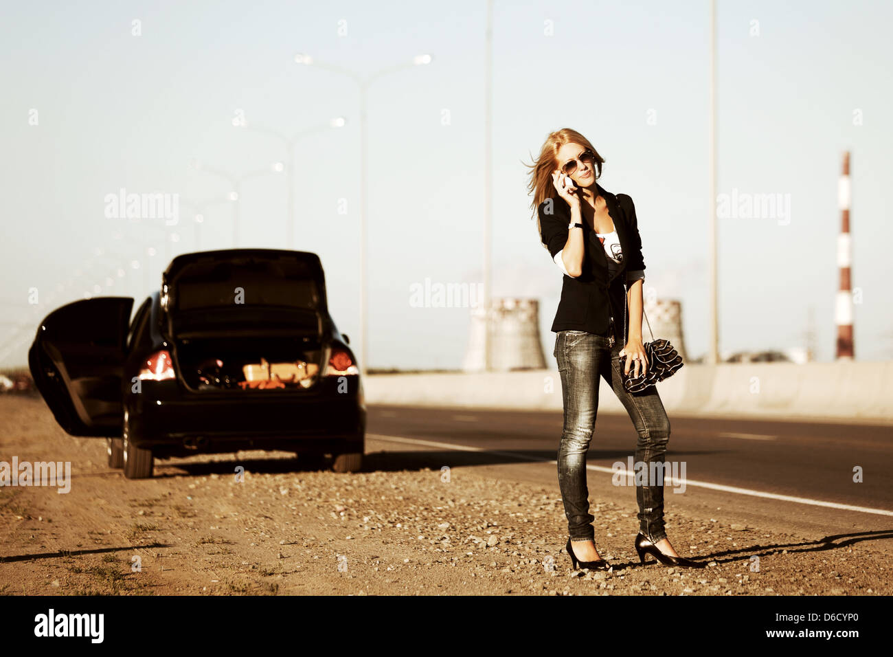 Young woman calling for help Stock Photo - Alamy