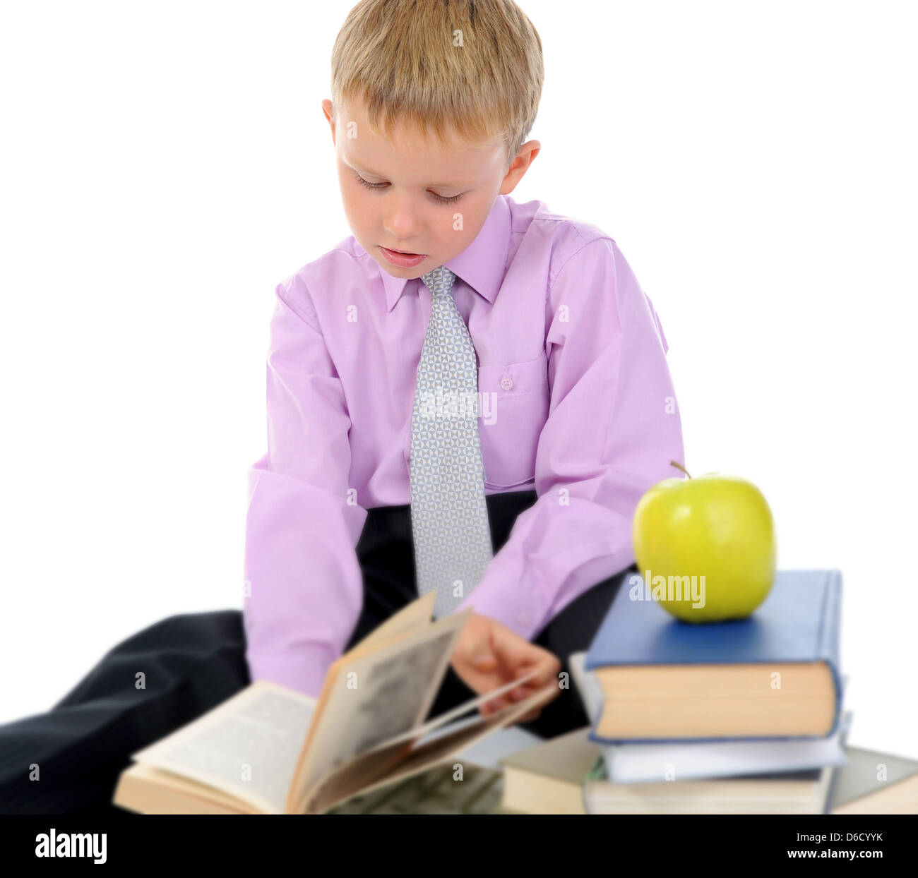 Boy reading a book Stock Photo - Alamy