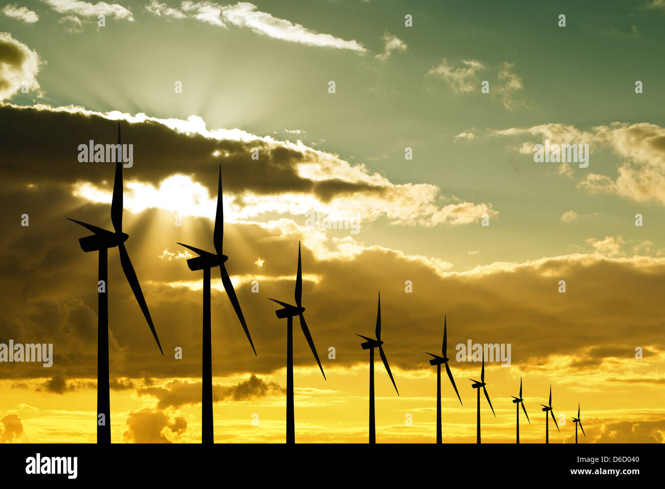 Wind turbines at sunset Stock Photo - Alamy