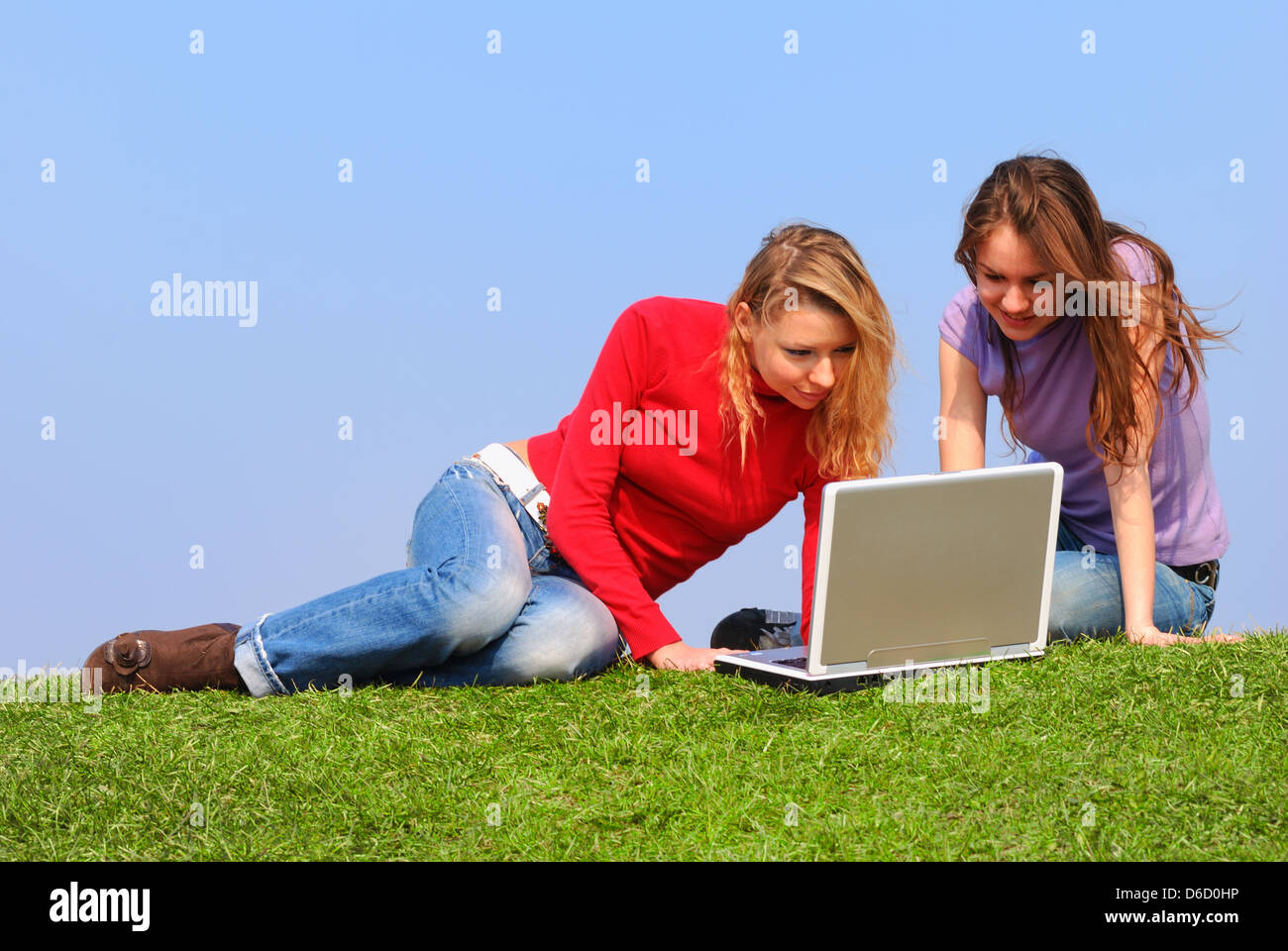 Girls with notebook Stock Photo - Alamy