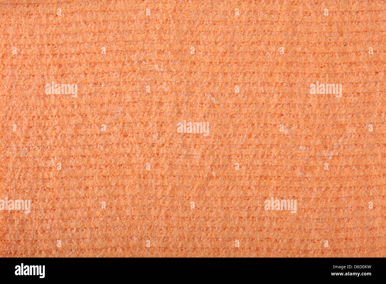 Orange kitchen sponge rubber foam as background texture Stock Photo - Alamy