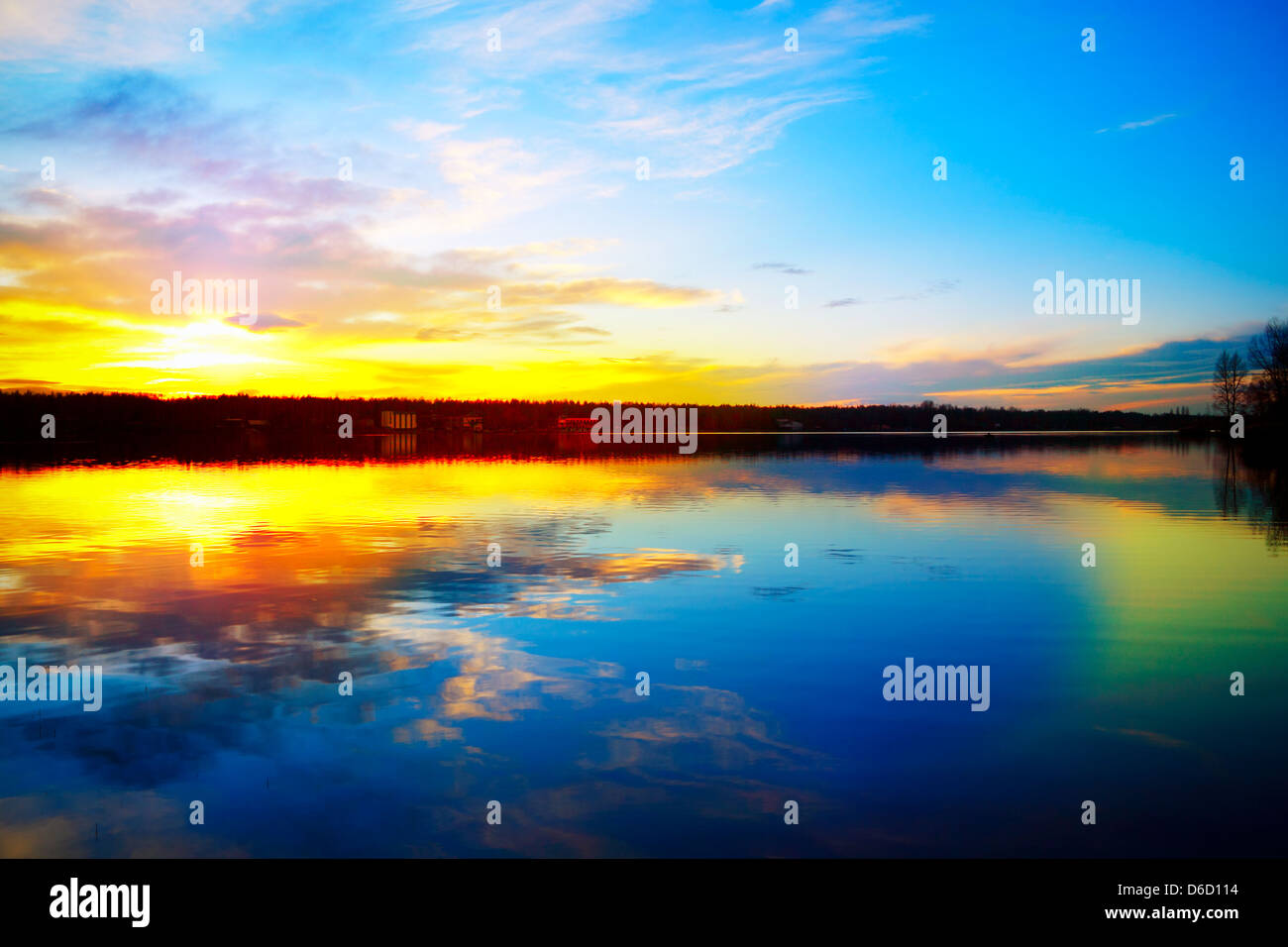 Sunset over lake Stock Photo - Alamy