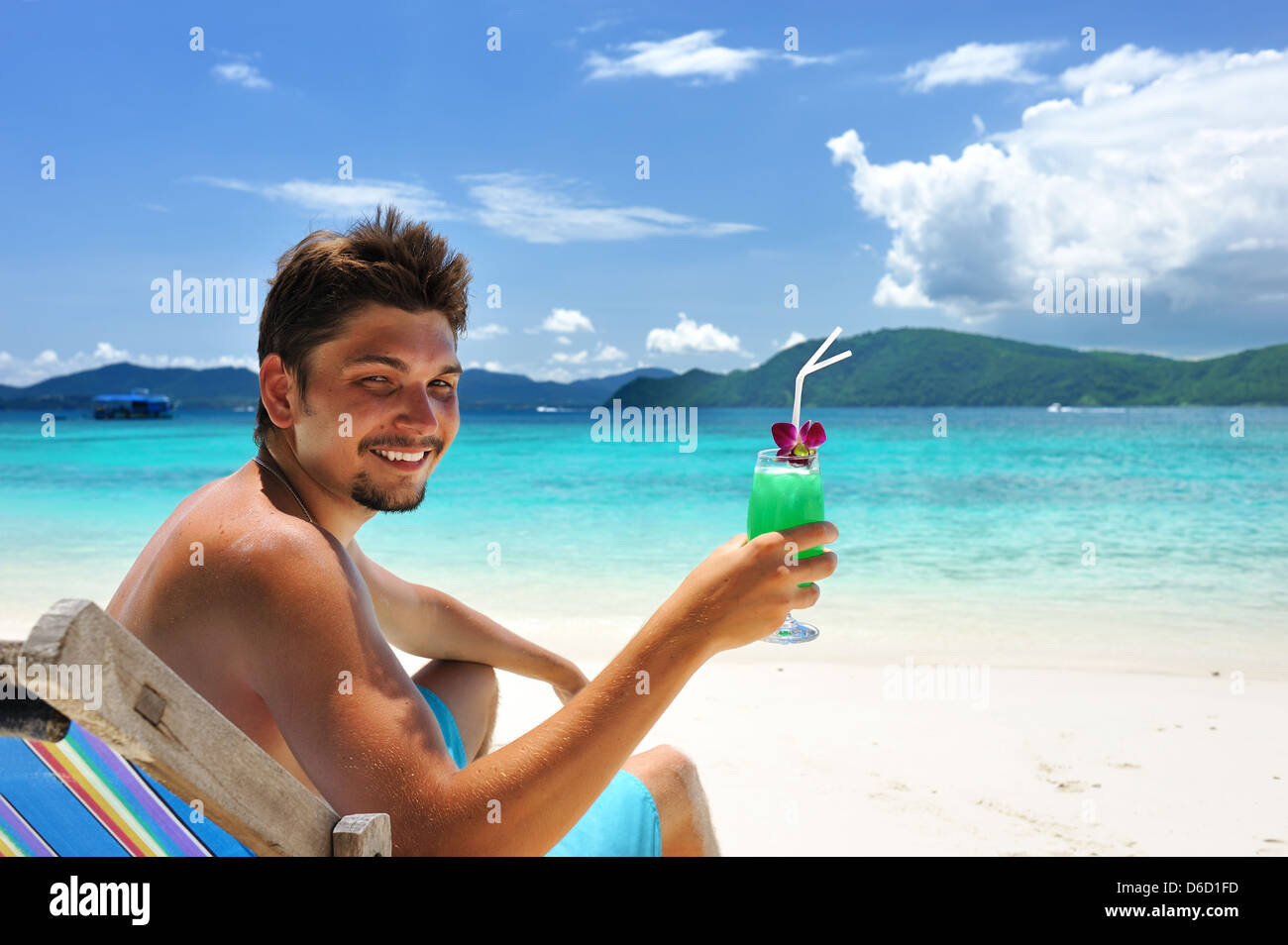 Man on a beach Stock Photo - Alamy