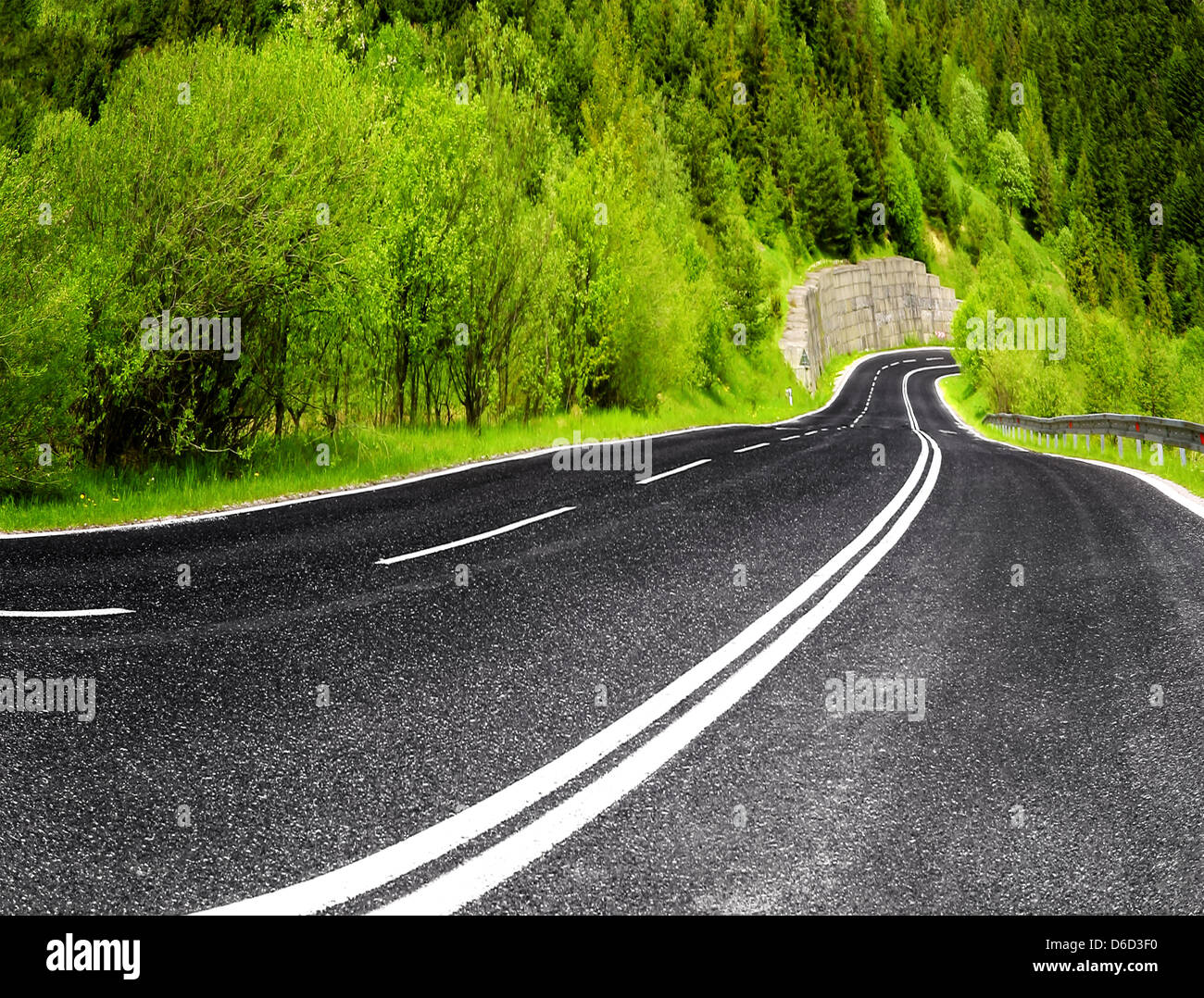Empty mountain road in spring Stock Photo - Alamy