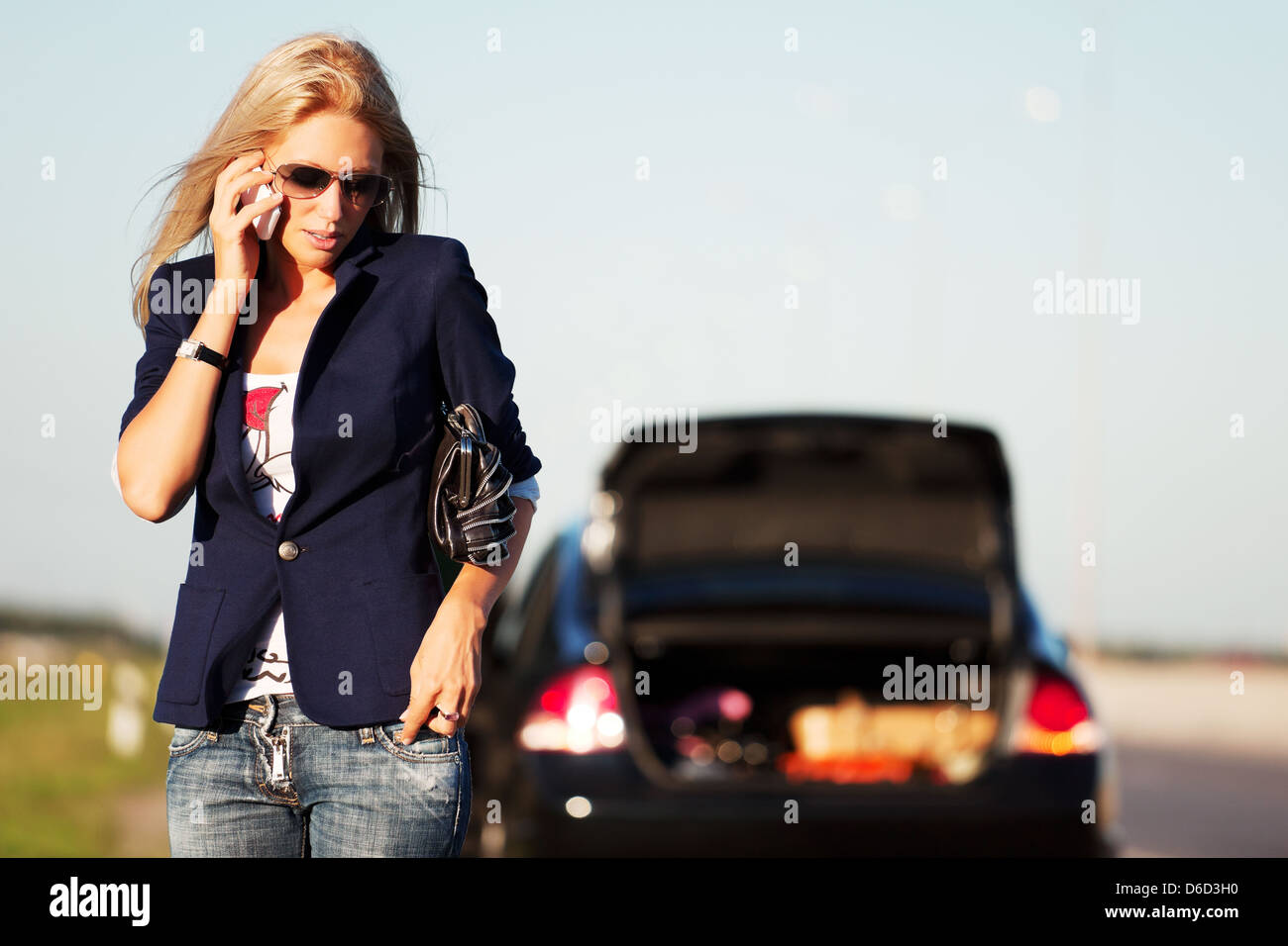 Young woman calling for help Stock Photo - Alamy