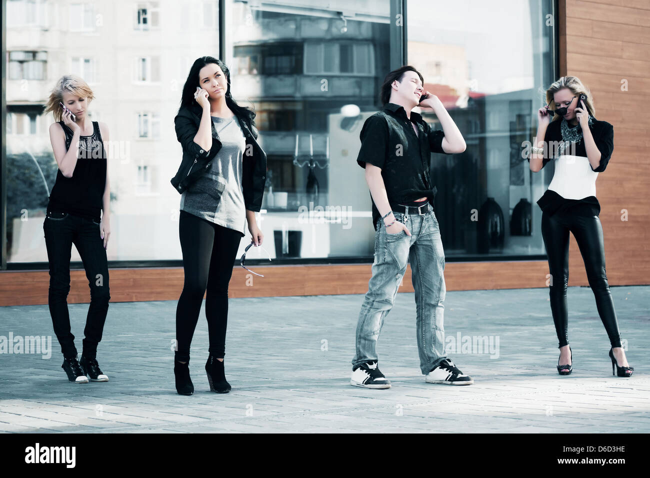 Young people calling on the phones Stock Photo - Alamy