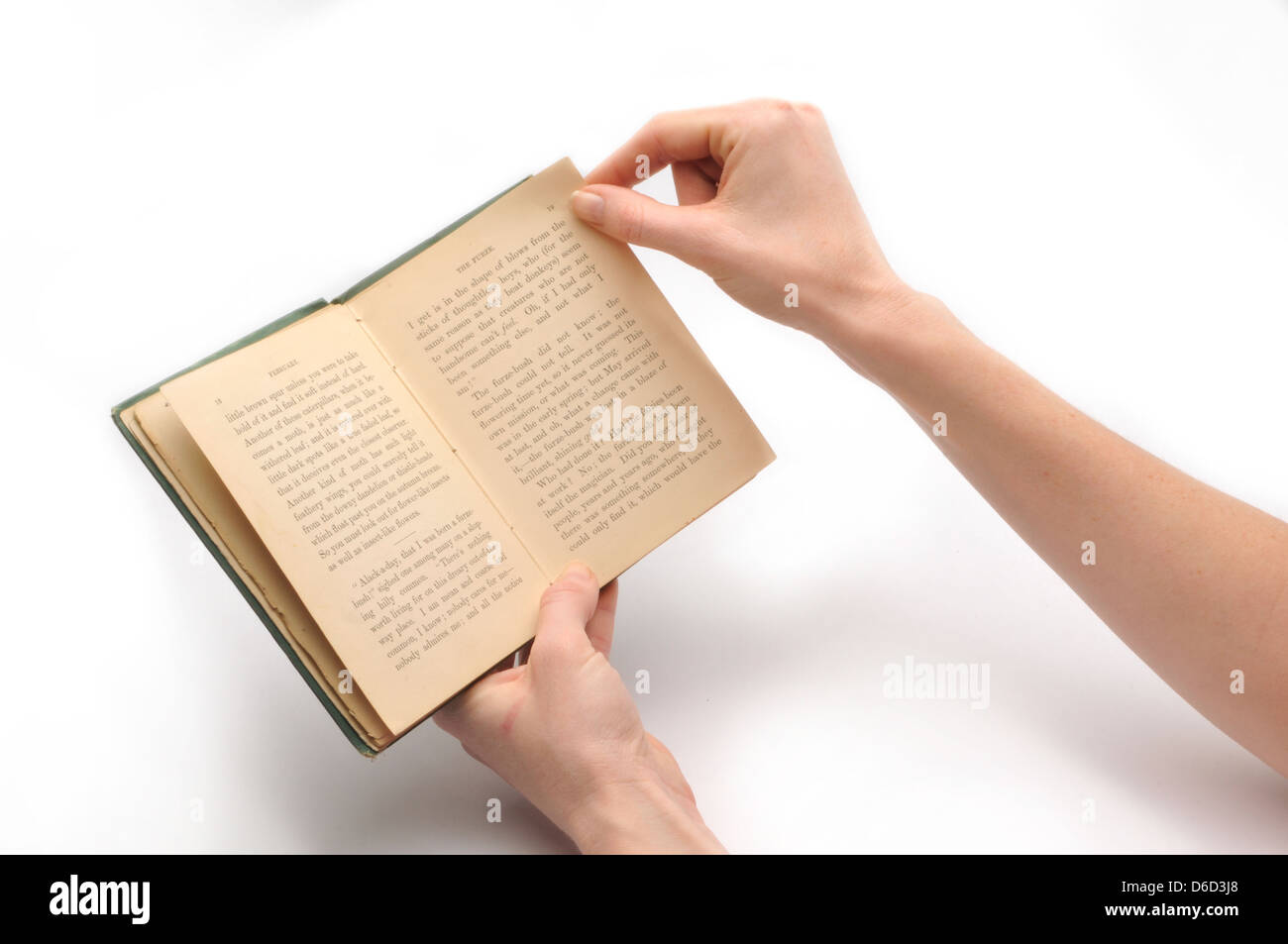hand holding old childrens book Stock Photo - Alamy
