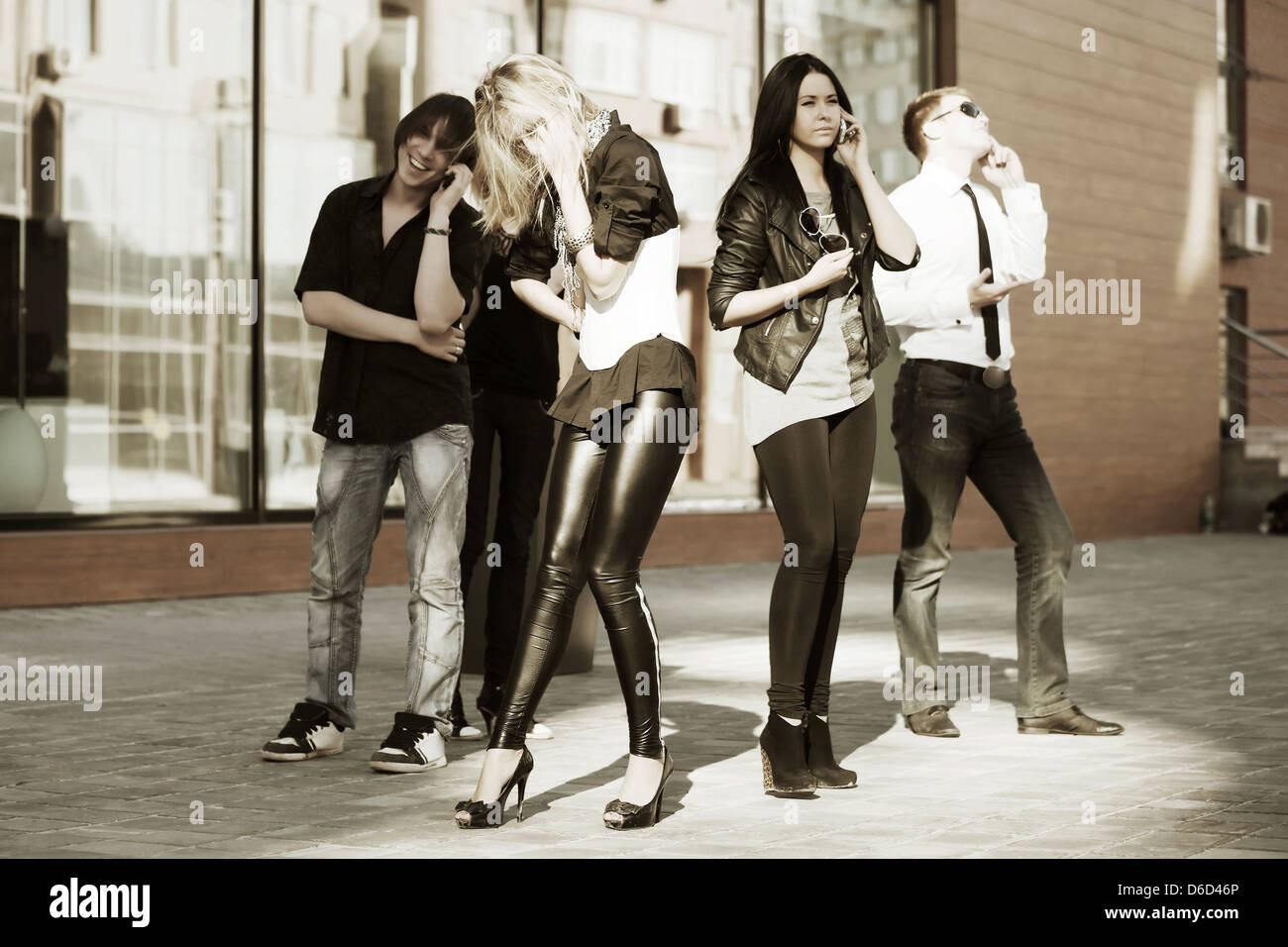 Young people calling on the phones Stock Photo - Alamy