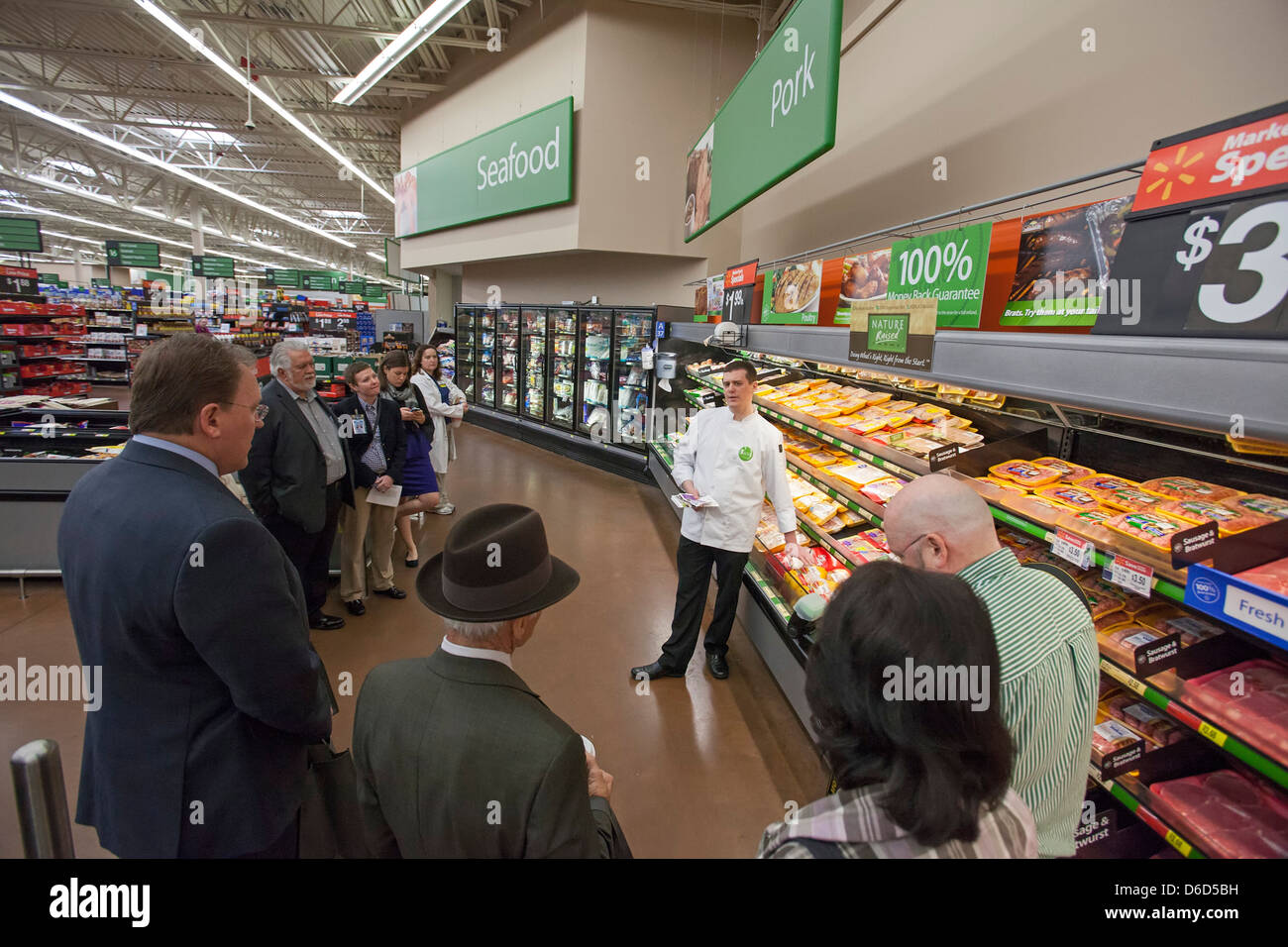 Jake Williams leads a "Cooking Matters" workshop in the grocery section ...
