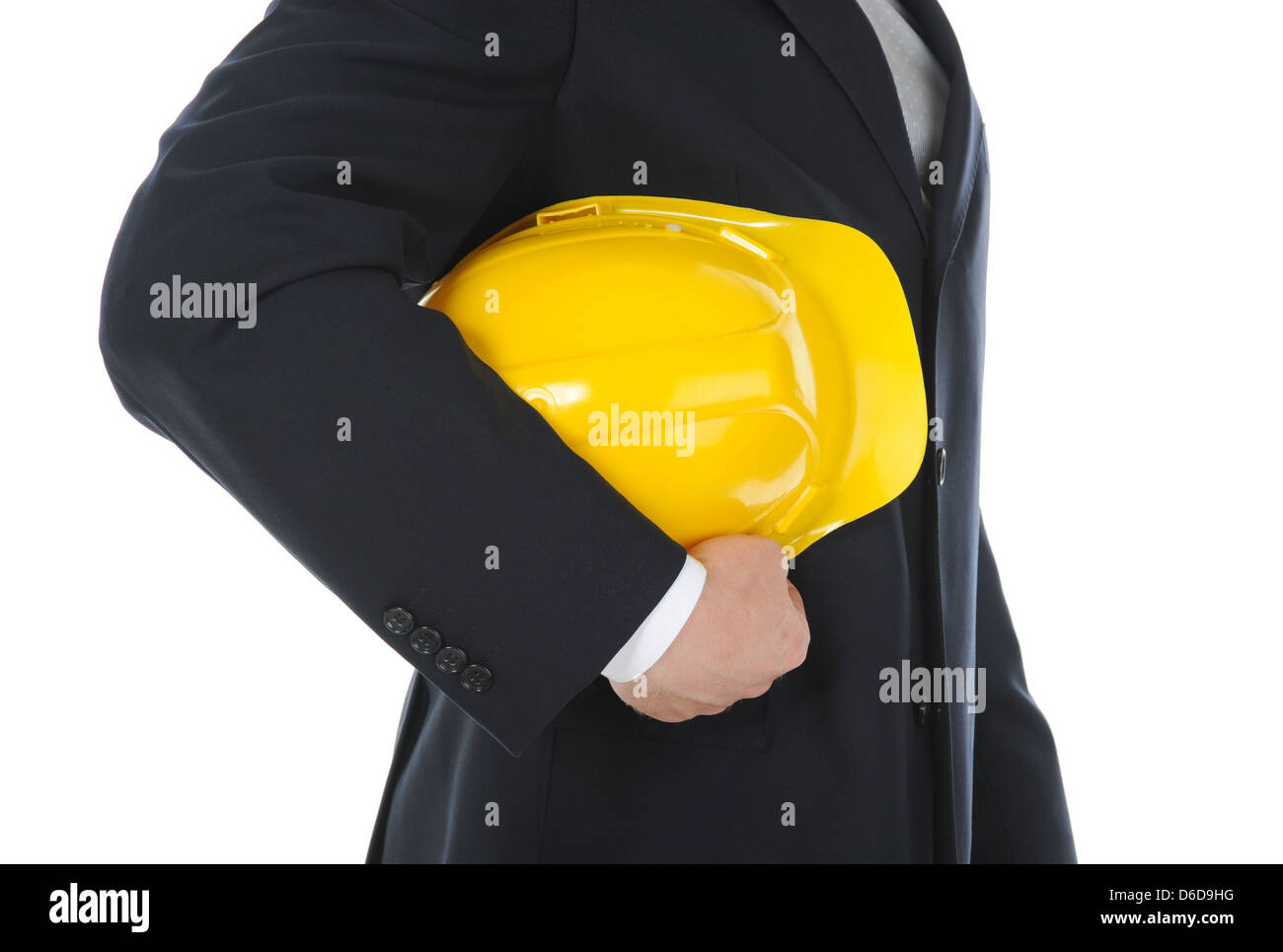 Businessman with construction helmet Stock Photo - Alamy