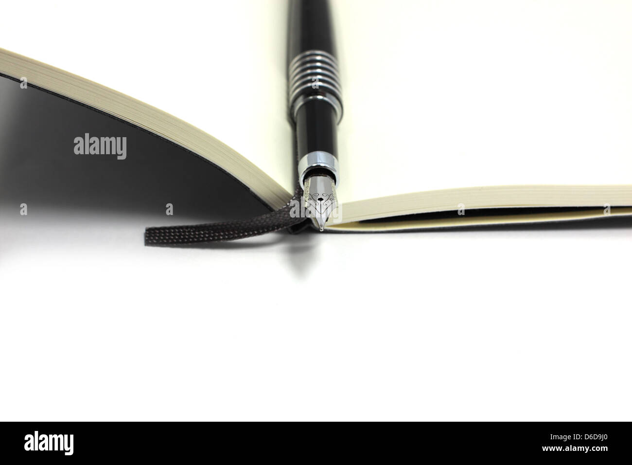notebook and a pen Stock Photo - Alamy