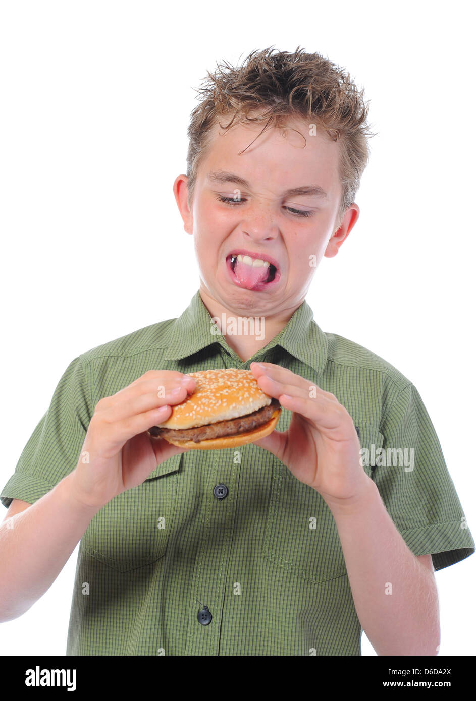 Little boy eating a hamburger Stock Photo - Alamy