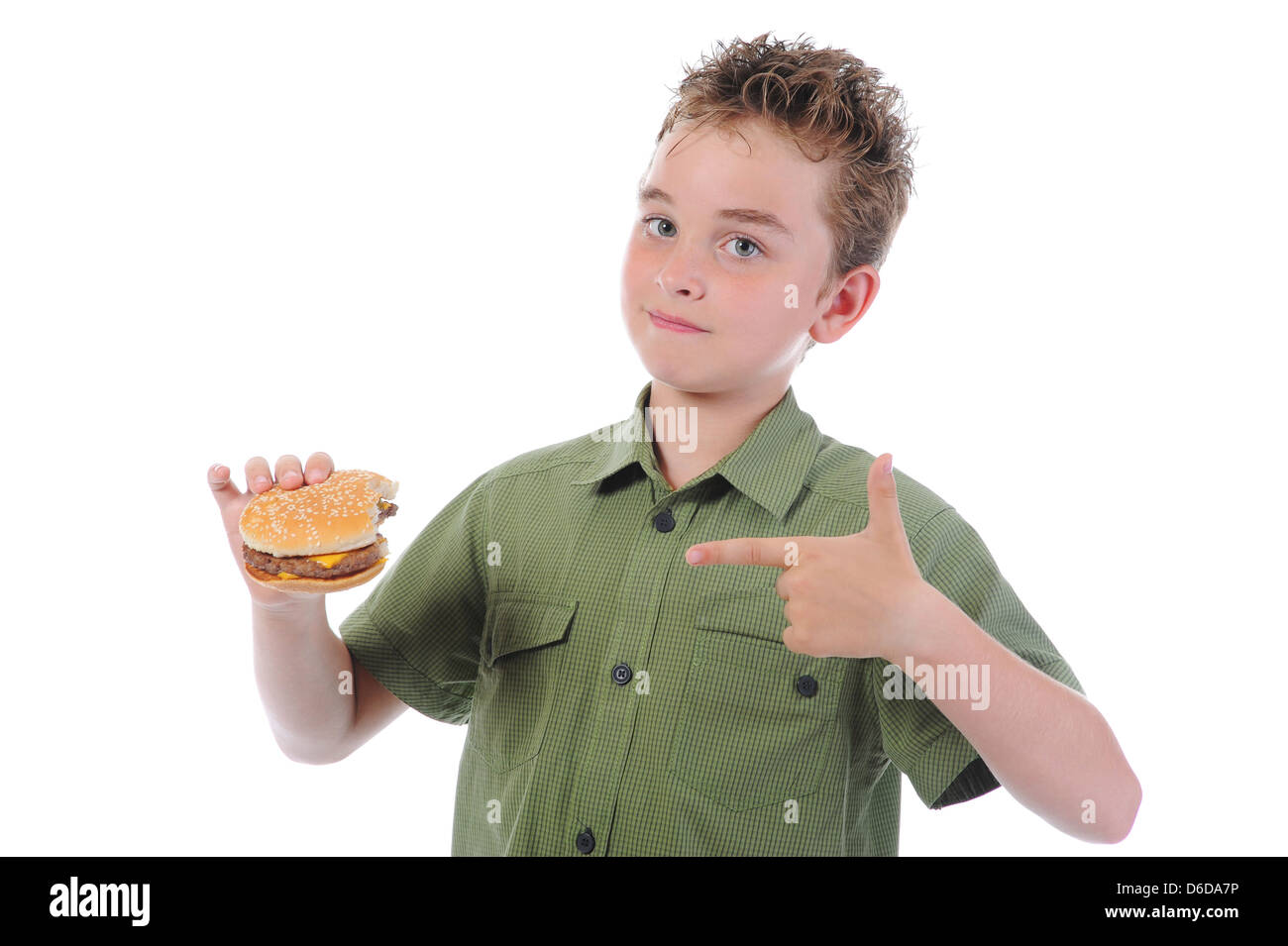 Little boy eating a hamburger Stock Photo - Alamy