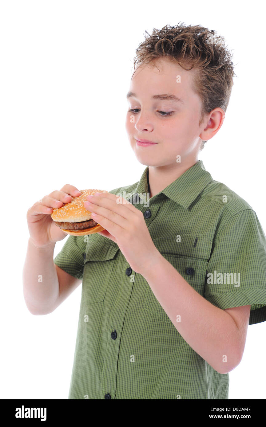 Little boy eating a hamburger Stock Photo - Alamy