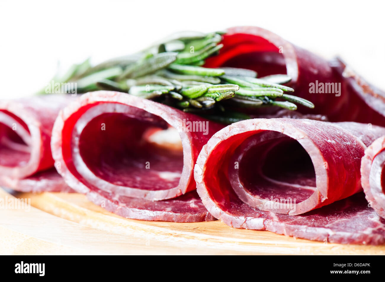 Rolls of cured smoked beef Stock Photo - Alamy