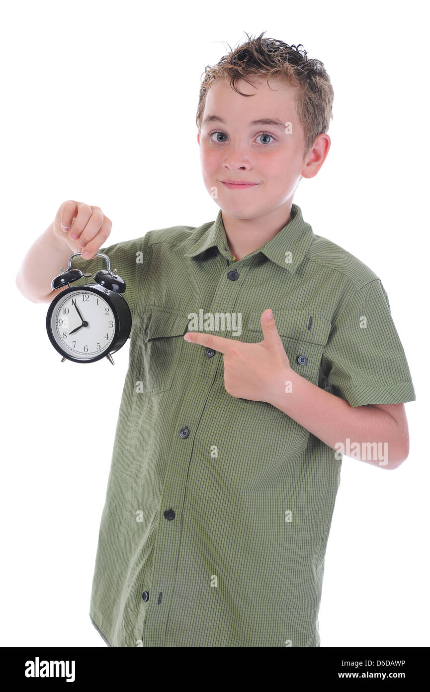 Sleepy boy with alarm-clock Stock Photo - Alamy