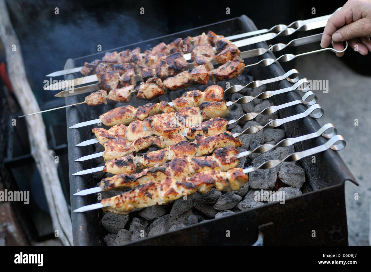 Sizzling meat skewers hi-res stock photography and images - Alamy