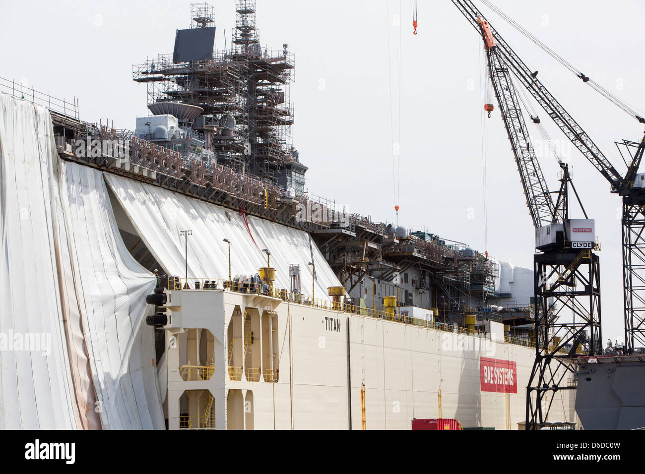 United States Navy ships under repair in the BAE systems shipyard in ...