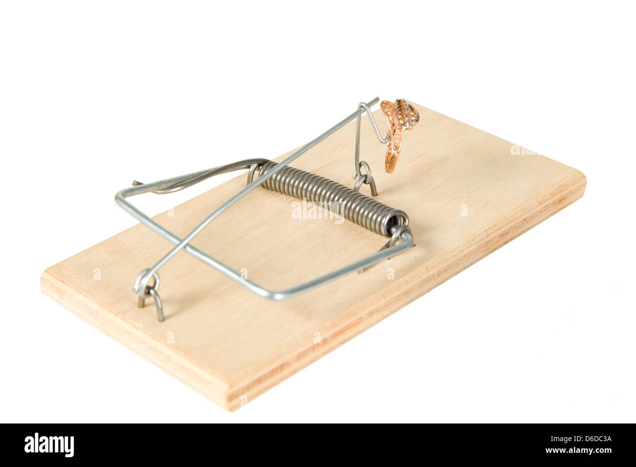 A mouse trap with golden ring on it Stock Photo - Alamy