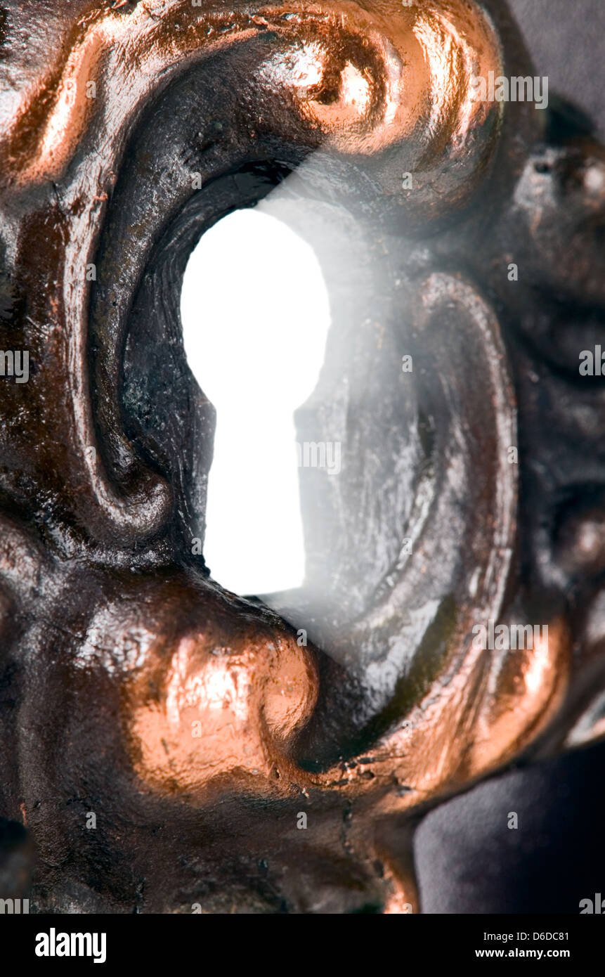 Light is coming through the hole of key, hope concept Stock Photo - Alamy