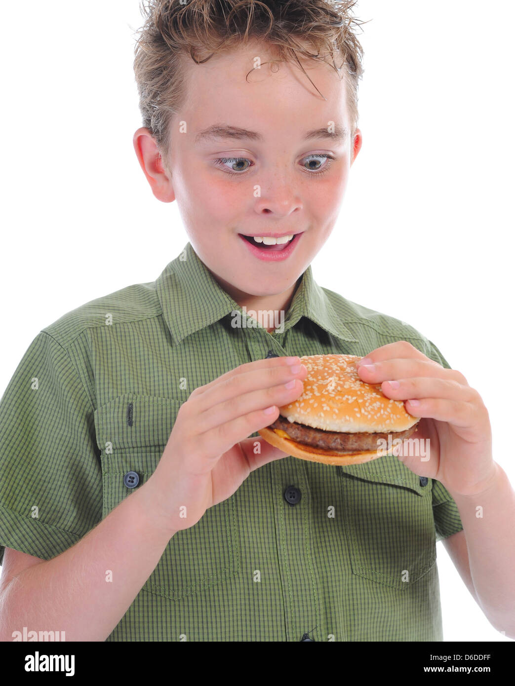 Little boy eating a hamburger Stock Photo - Alamy