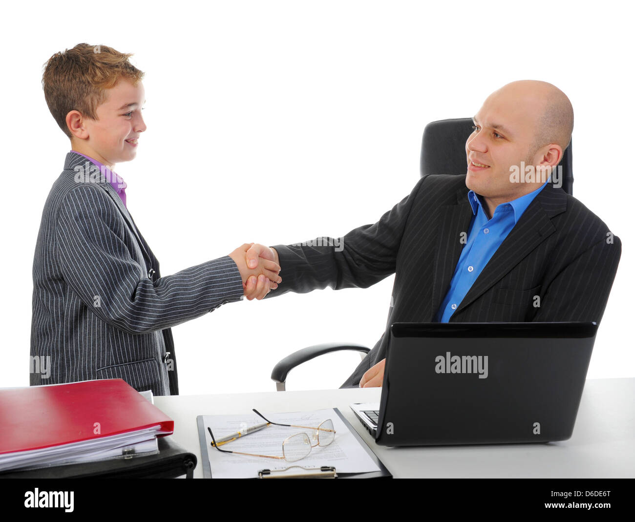 Handshake man and boy Stock Photo - Alamy