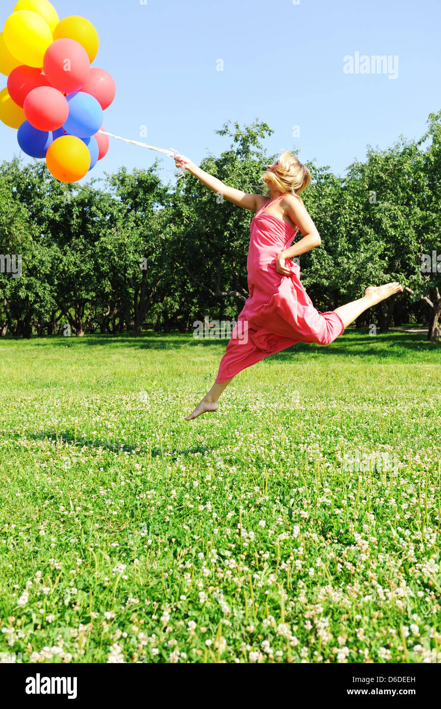 Flying with balloons Stock Photo - Alamy