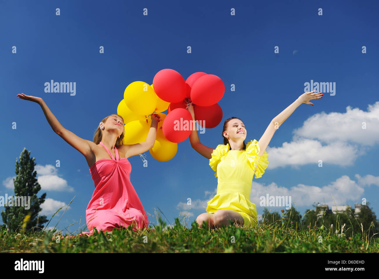 Girls with balloons Stock Photo - Alamy