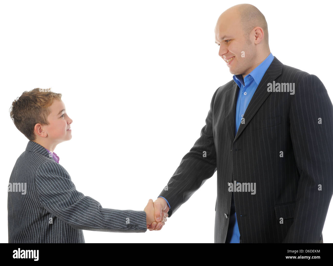 Handshake man and boy Stock Photo - Alamy