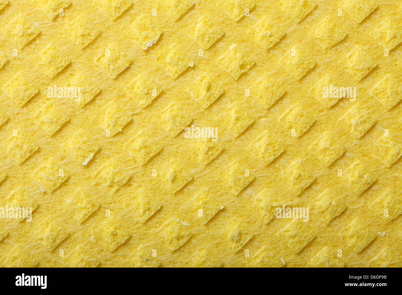 Yellow kitchen sponge rubber foam as background texture Stock Photo - Alamy