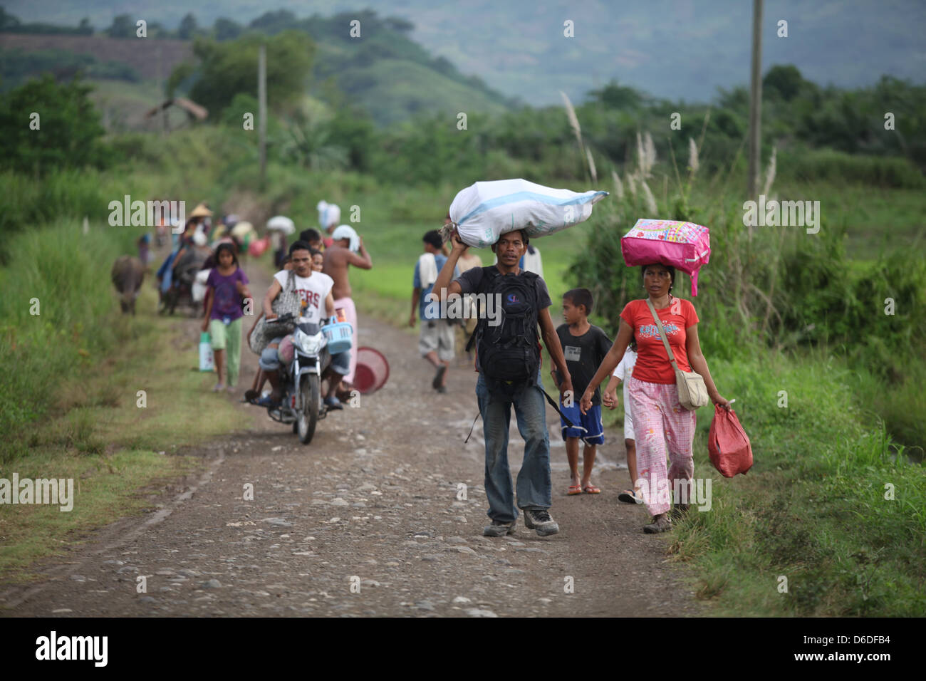 Locals from a remote village in the township of Ampatuan, southern ...