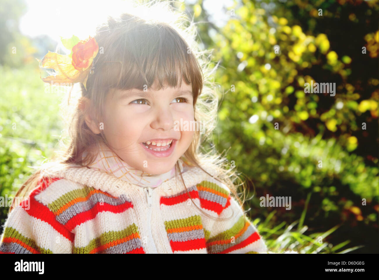 Laughing Little Girl Outdoors on Sunny Spring Day Stock Photo - Alamy