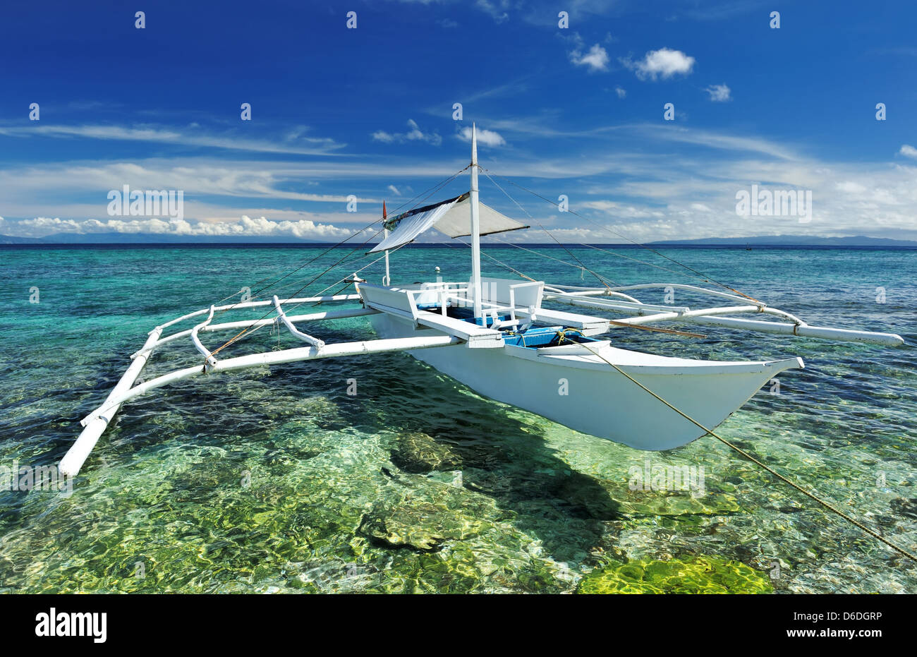 Beautiful beach with boat Stock Photo - Alamy