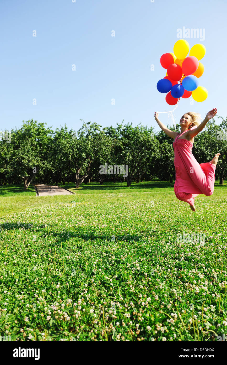 Flying with balloons Stock Photo - Alamy