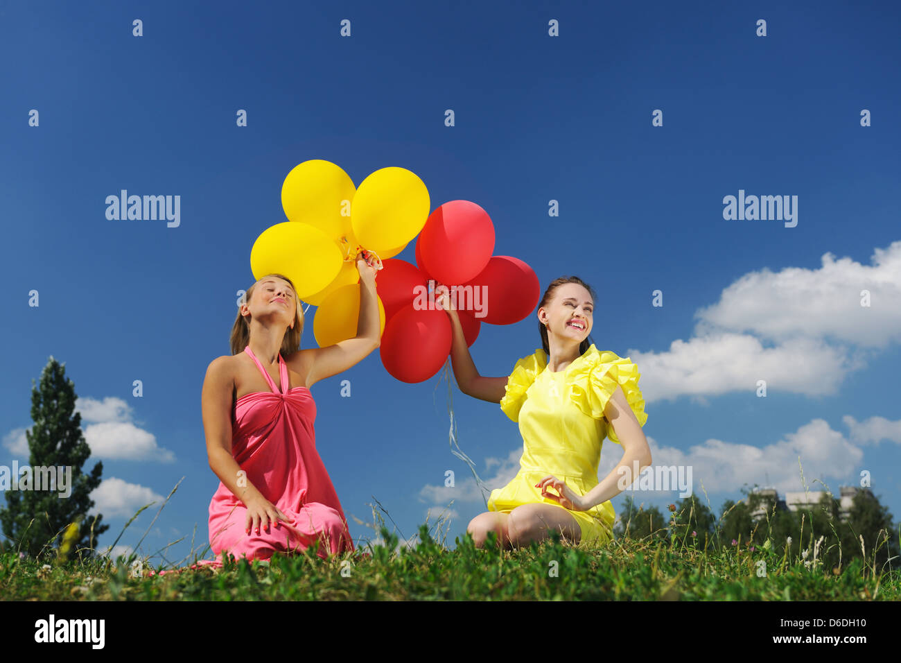 Girls with balloons Stock Photo - Alamy