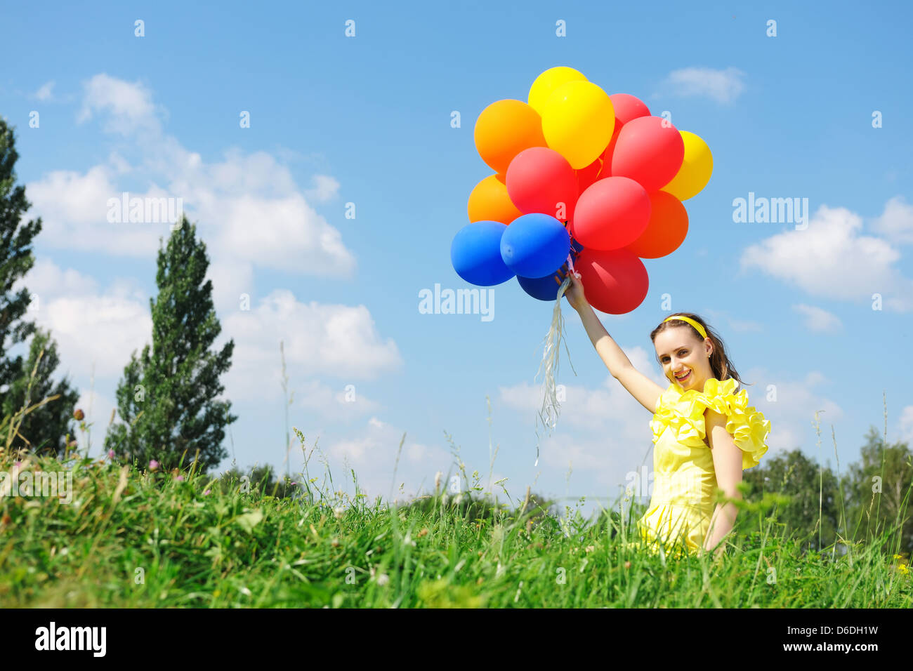 Girl with balloons Stock Photo - Alamy