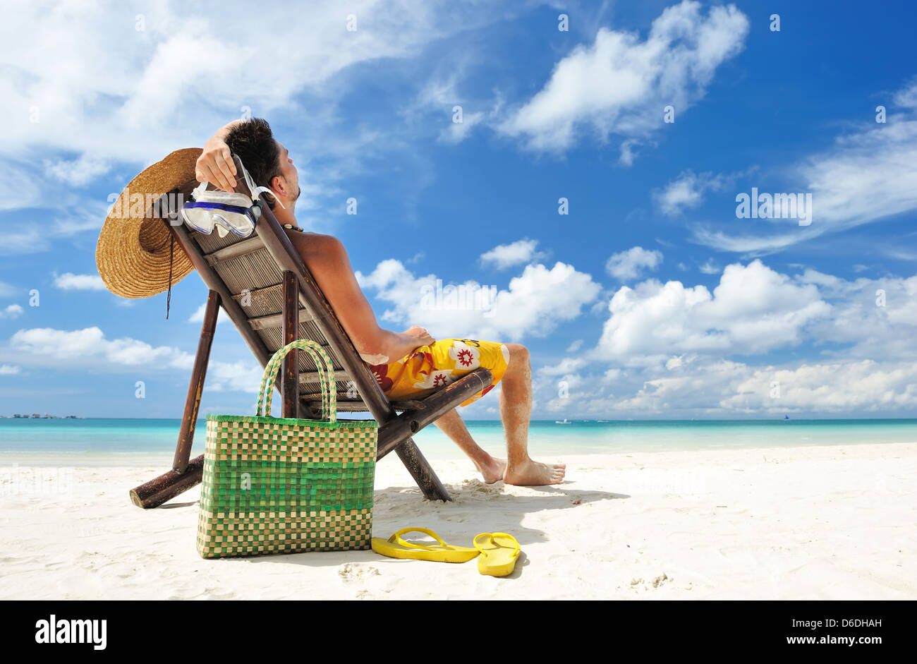 Man on a beach Stock Photo - Alamy