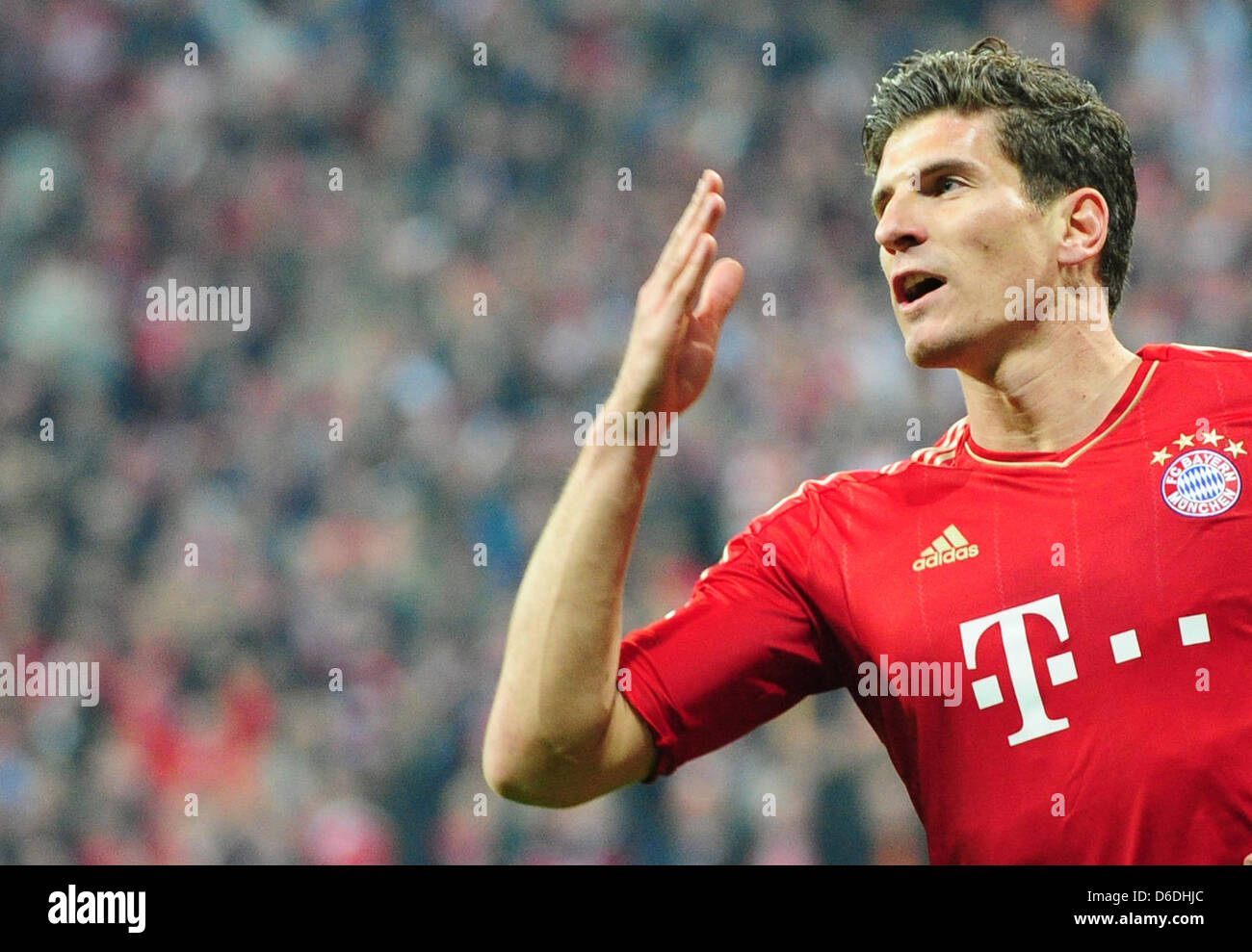 Munich's Mario Gomez celebrates his 5-1 goal during the DFB Cup semi ...