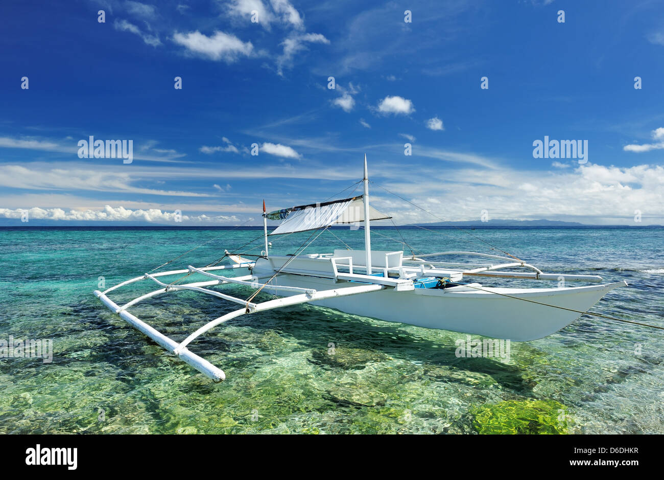 Beautiful beach with boat Stock Photo - Alamy