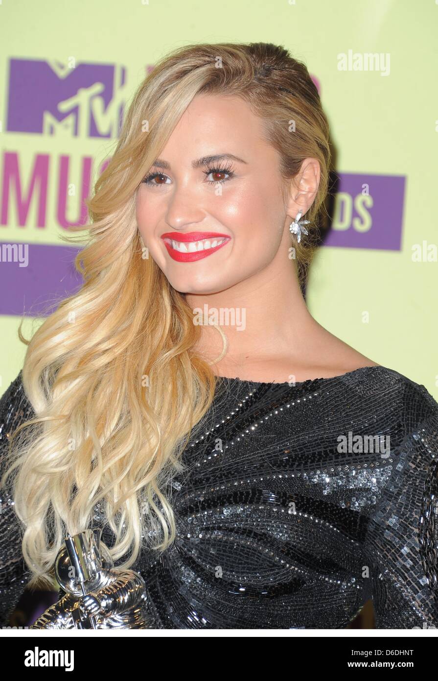 Singer Demi Lovato poses at the MTV Video Music Awards Photo Press Room ...