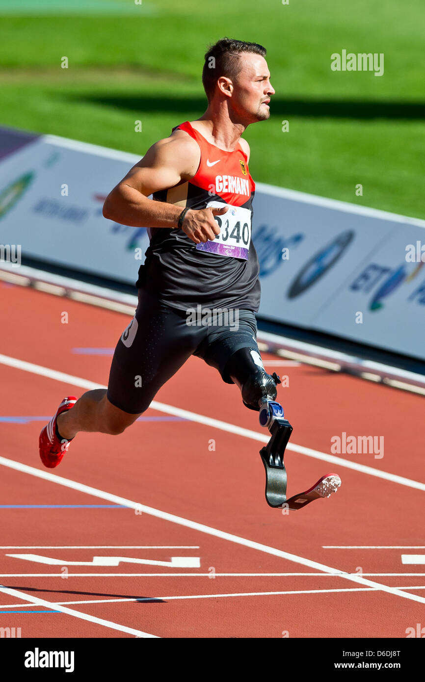 Heinrich Popow of Germany competes in the Men's 100m - T42 Round 1 Heat ...