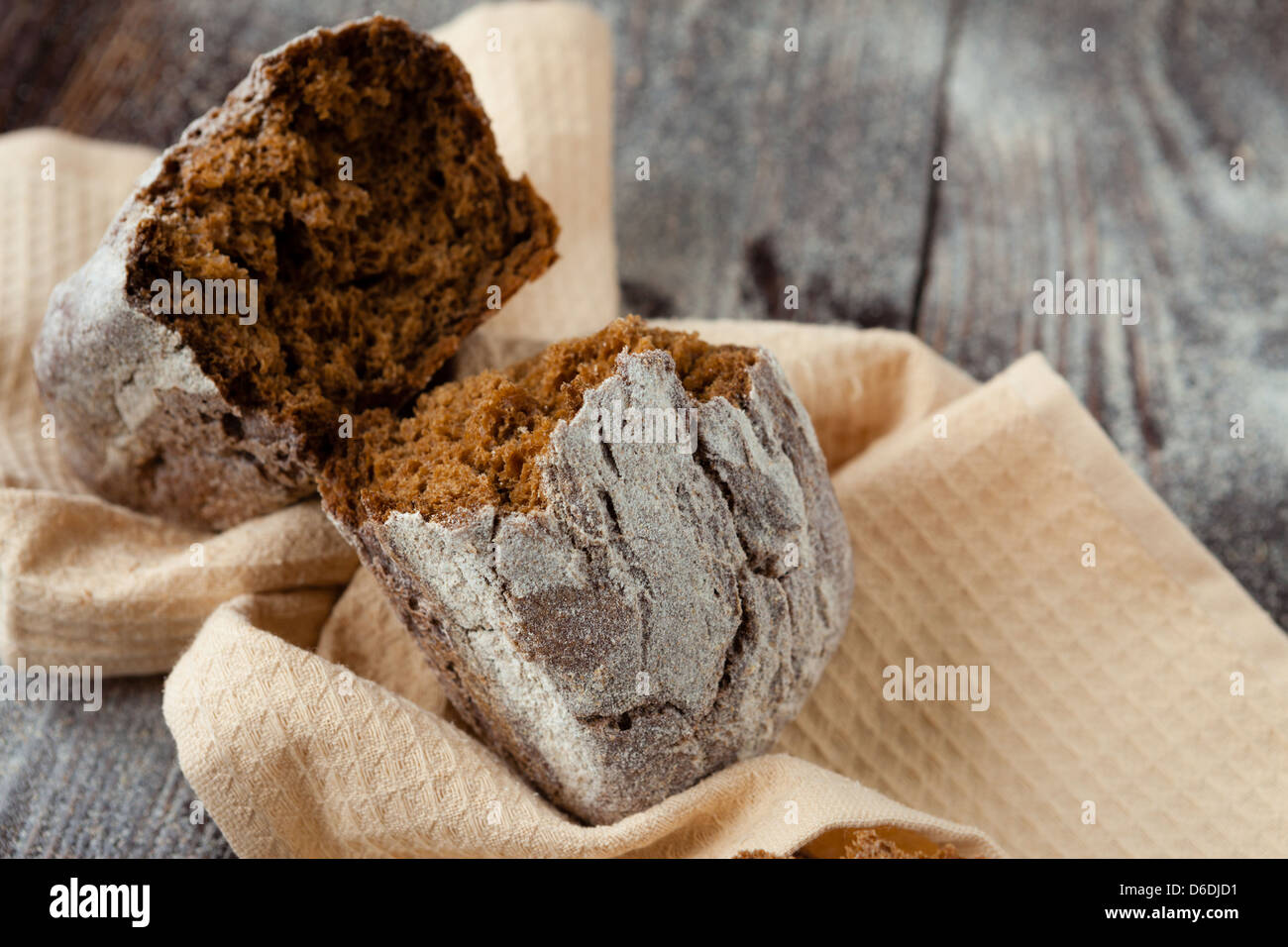 custard loaf of bread broken in half, closeup Stock Photo - Alamy